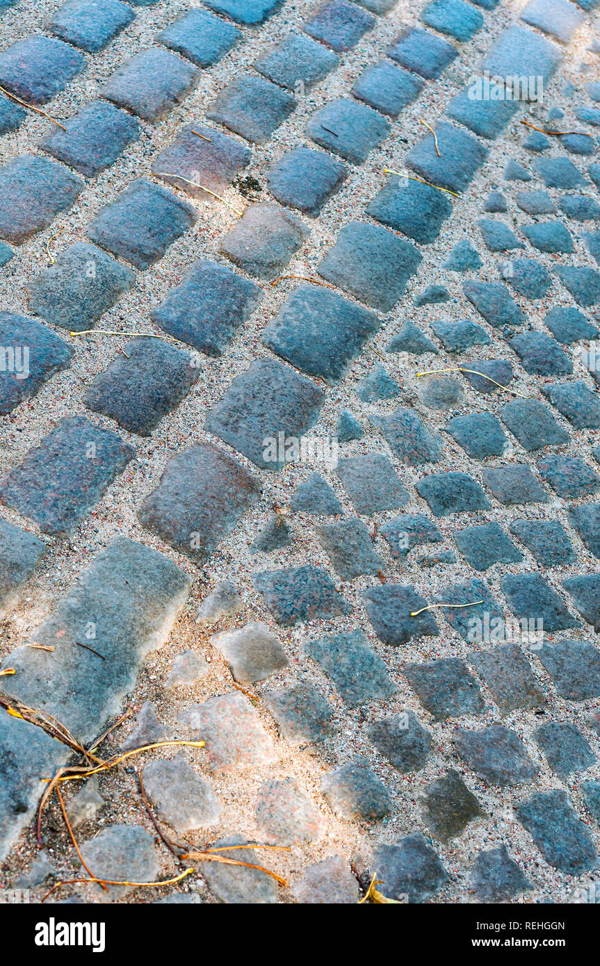 a smooth paving stone, road paving stones, cobblestones Stock Photo - Alamy