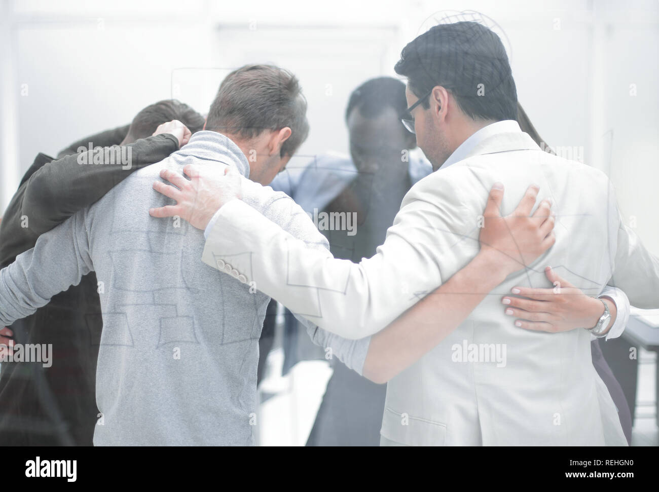 Men hug business suit hi-res stock photography and images - Alamy