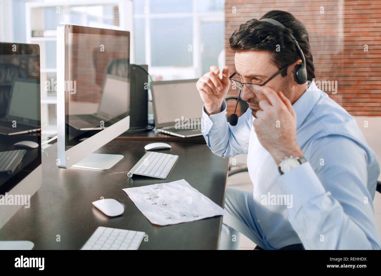 businessman analyzes the data sitting in the office Stock Photo - Alamy