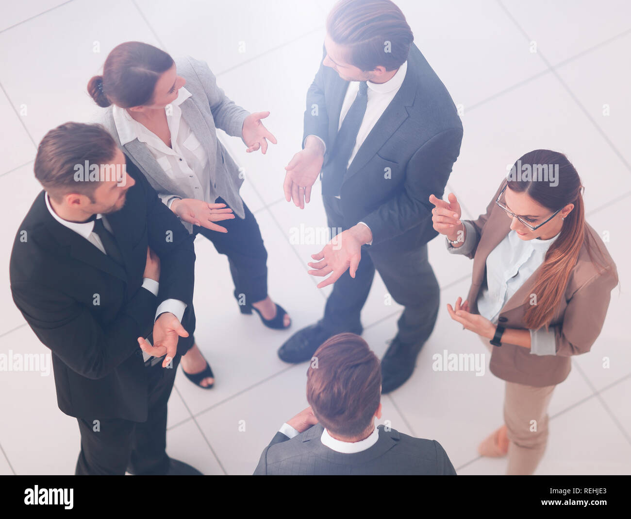 top view.a group of employees talking standing in the office Stock ...
