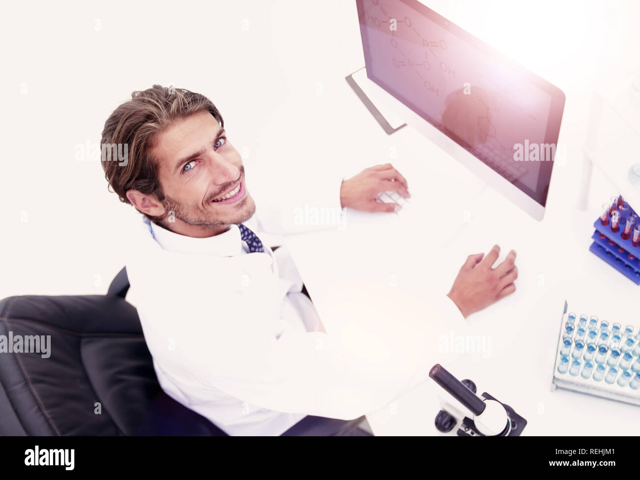 view from above of the scientist-doctor sitting on the computer Stock ...