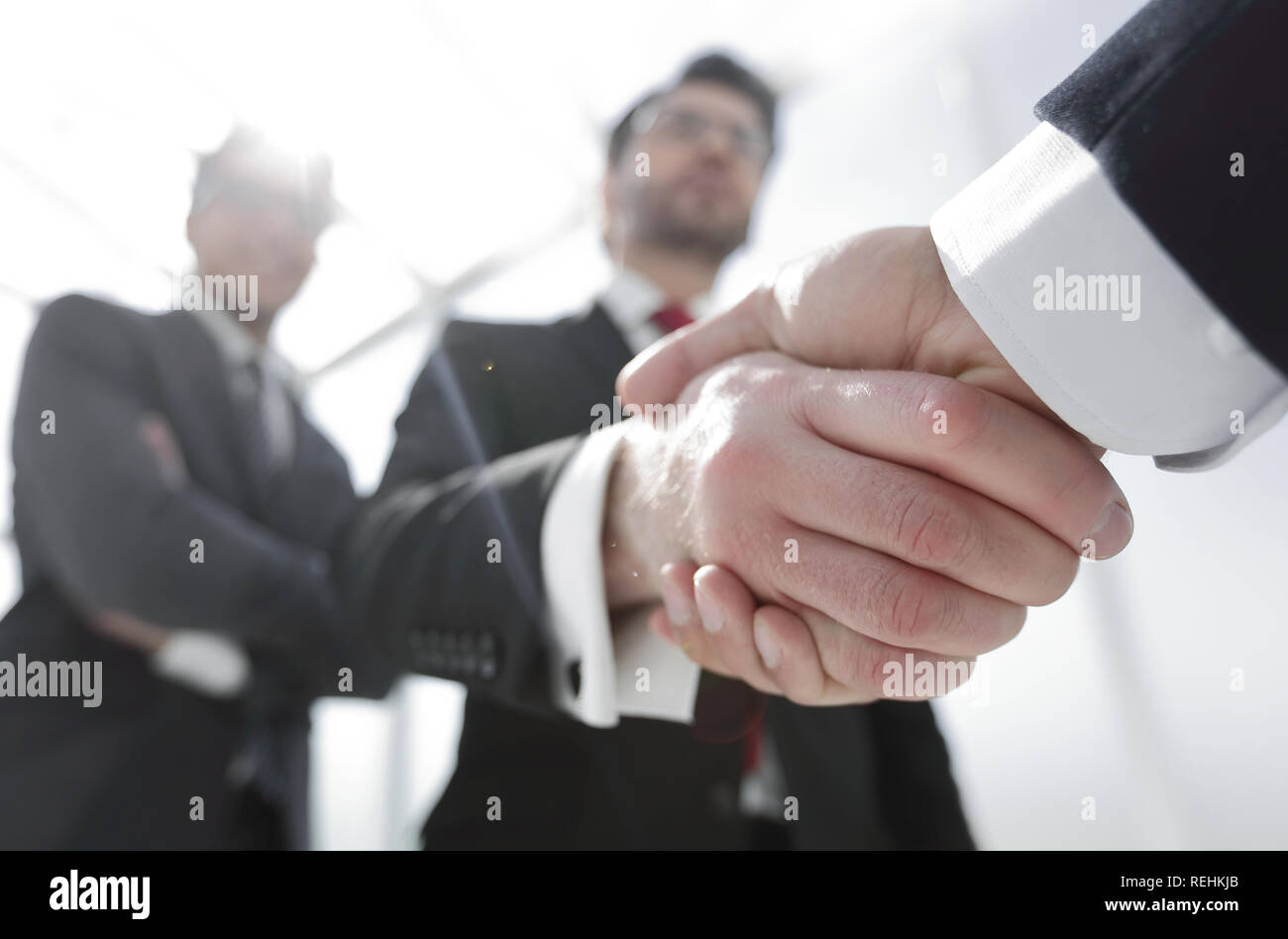 Stylized handshake hi-res stock photography and images - Alamy