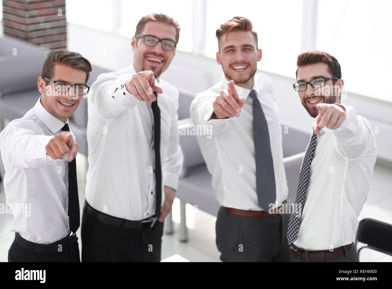 group of successful employees pointing to you Stock Photo - Alamy