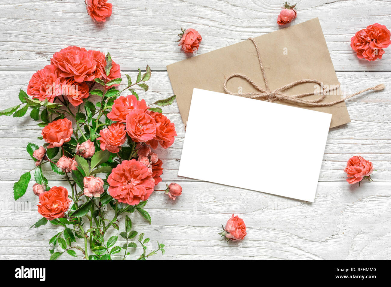 blank greeting card with bouquet of rose flowers in Living Coral color ...