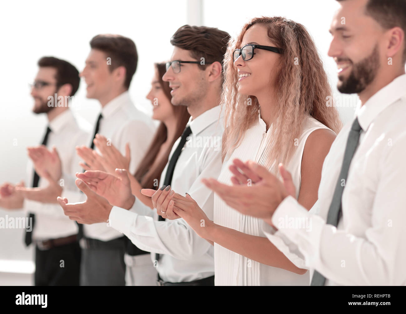 group of business people applauding standing Stock Photo - Alamy