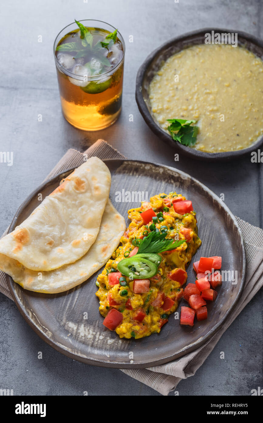 Akoori parsi style scrambled eggs with paratha Stock Photo - Alamy