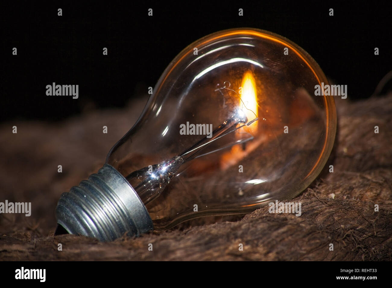 Flaming Light Bulb Stock Photo - Alamy
