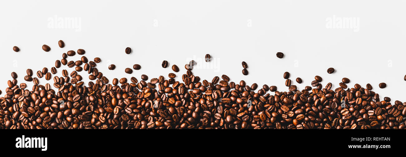 coffee beans on a white background, top view Stock Photo - Alamy