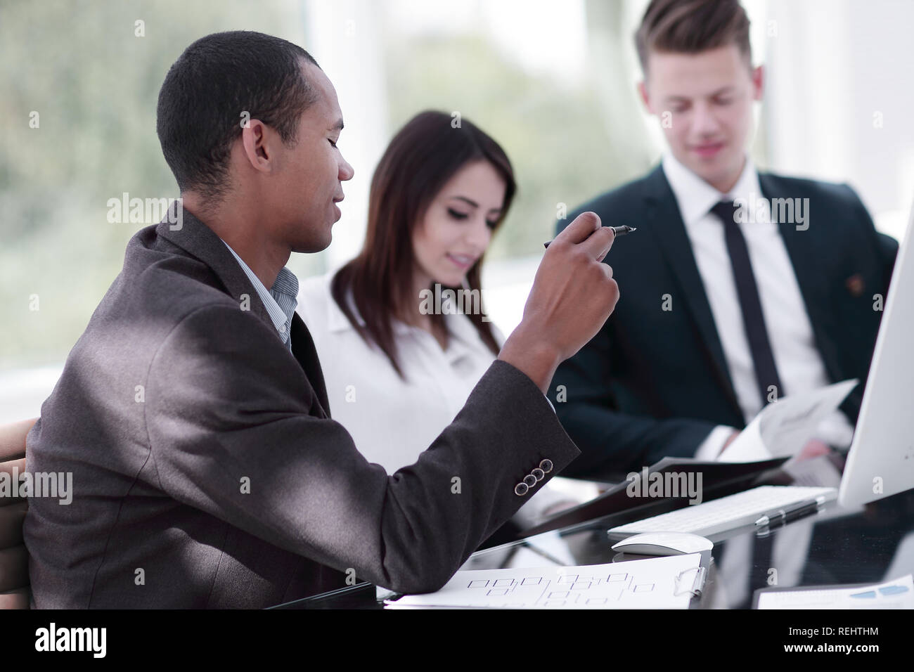 employees discussing new ideas in a modern office.t Stock Photo - Alamy