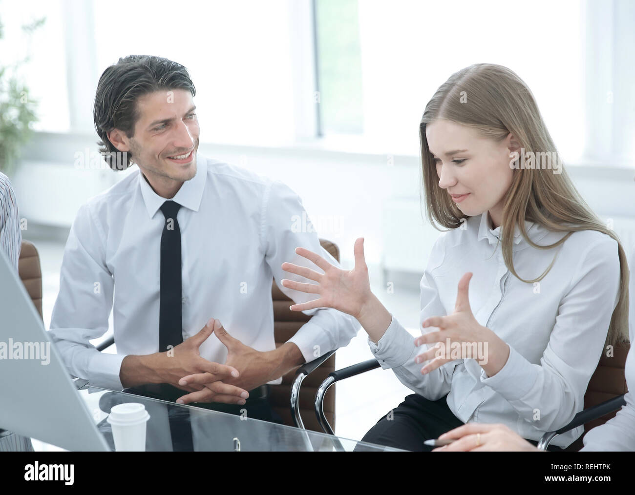 closeup.young business woman talking with colleagues. concept of ...