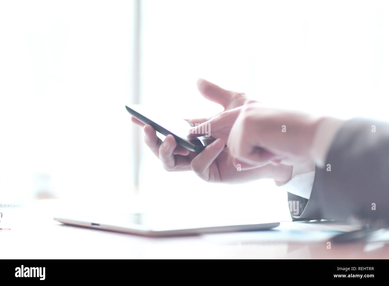 Man tapping smartphone showing tech hi-res stock photography and images ...