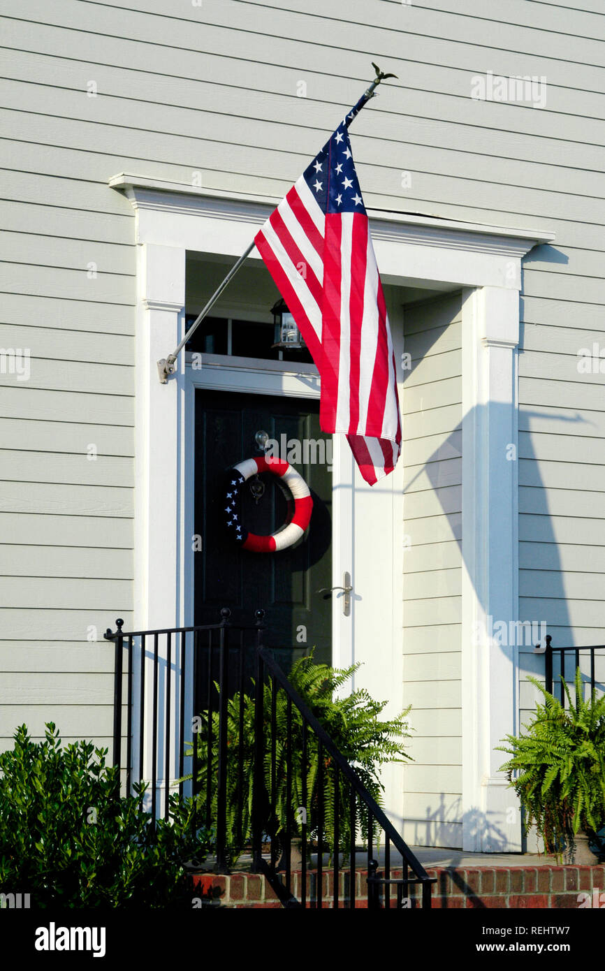 Front Porch with an American Flag Stock Photo - Alamy