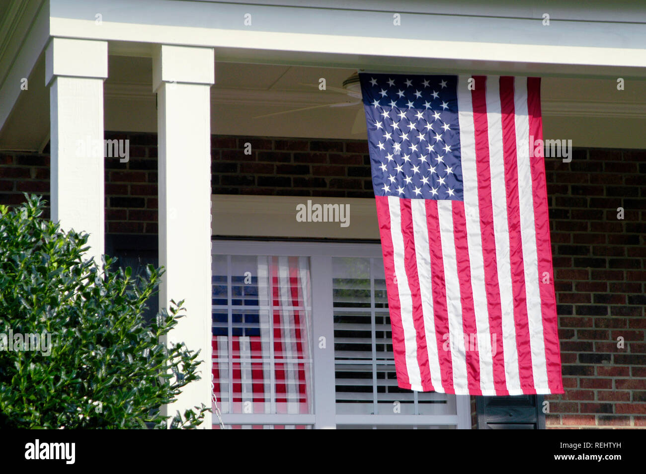 Front Porch of Home with an American Flag Stock Photo - Alamy