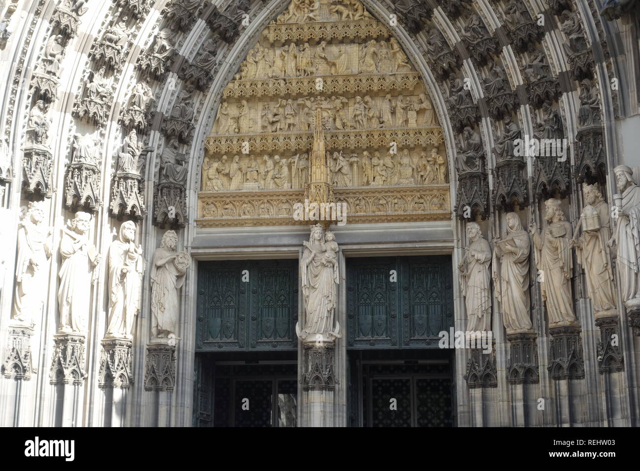 The arch of the main entrance of the Cologne Cathedral in Germany Stock ...