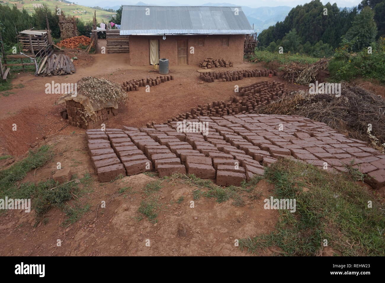 Making traditional mud bricks, Uganda Stock Photo - Alamy