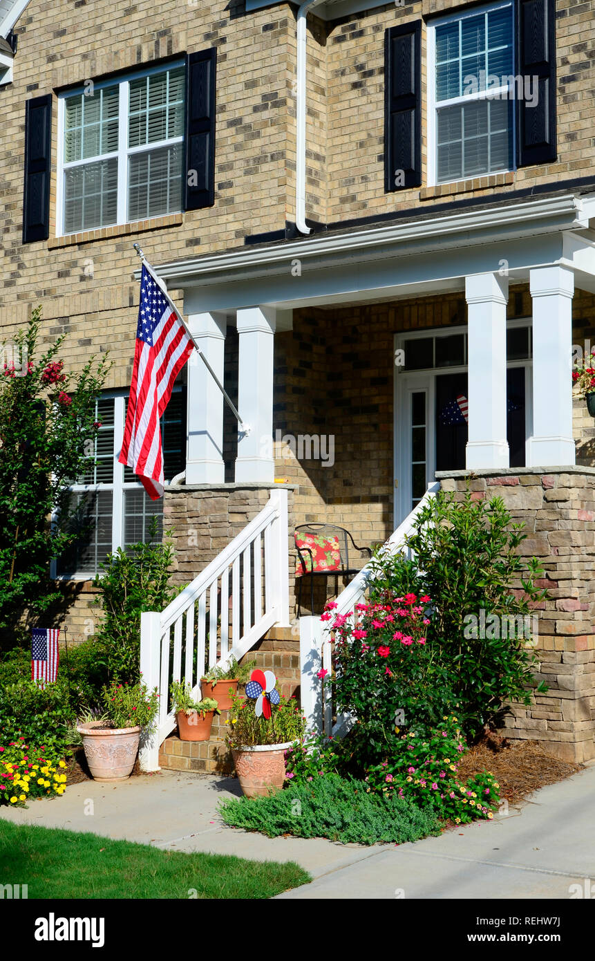 Front Porch of Home with an American Flag Stock Photo - Alamy