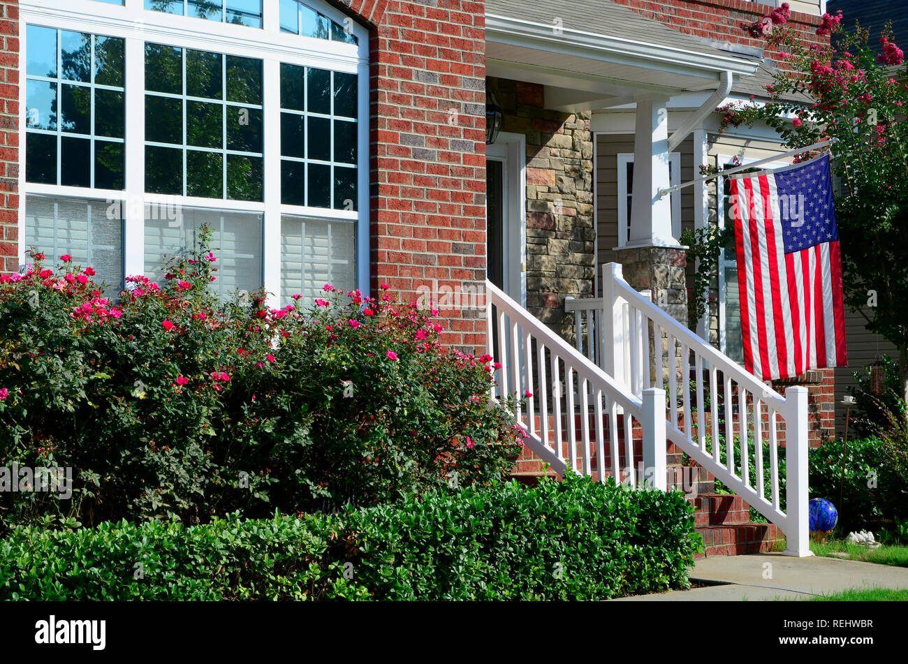 Front Porch of Home with an American Flag Stock Photo - Alamy