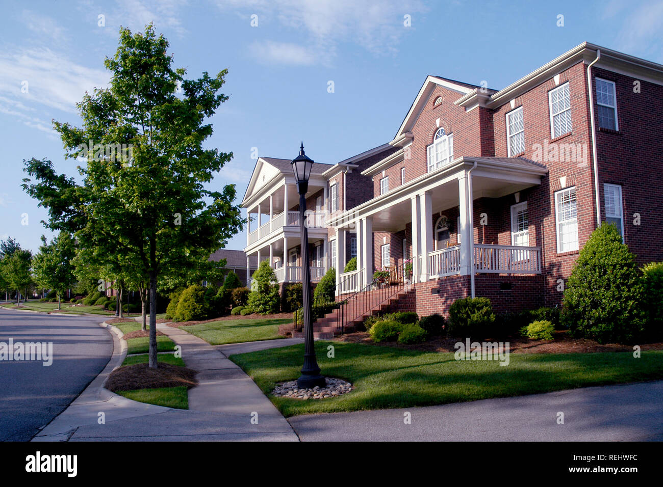 Neighborhood of Brick Houses Stock Photo - Alamy