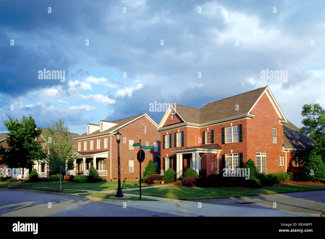 Neighborhood of Brick Houses Stock Photo - Alamy