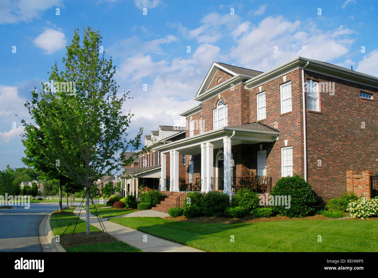 Neighborhood of Brick Houses Stock Photo - Alamy