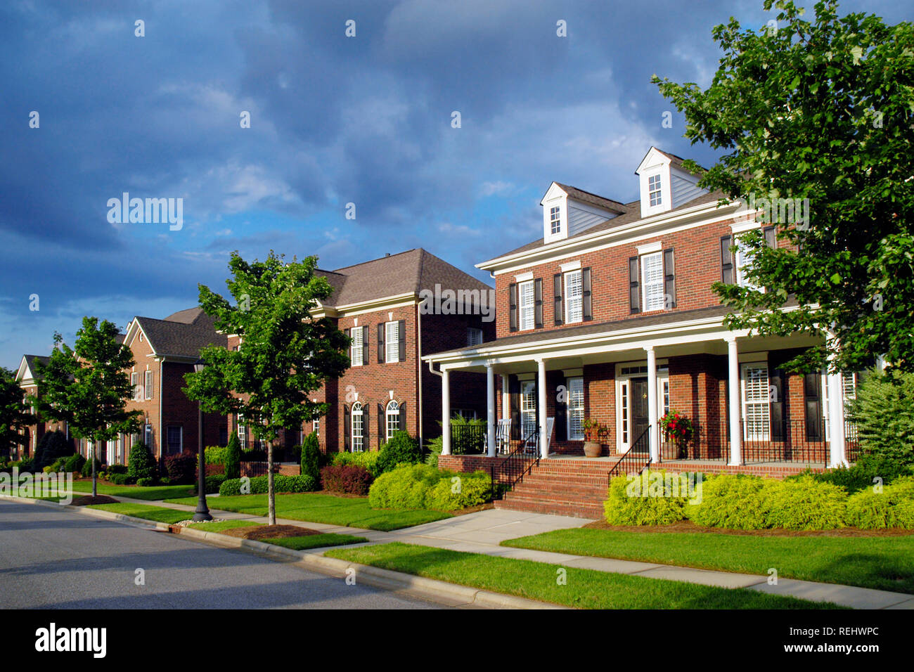 Neighborhood of Brick Houses Stock Photo - Alamy