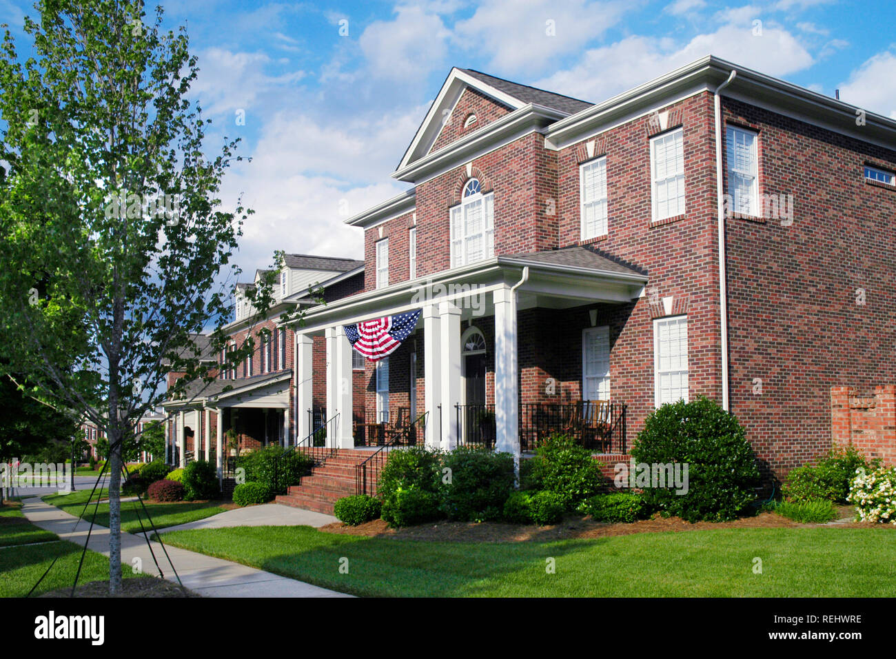Neighborhood of Brick Houses Stock Photo - Alamy