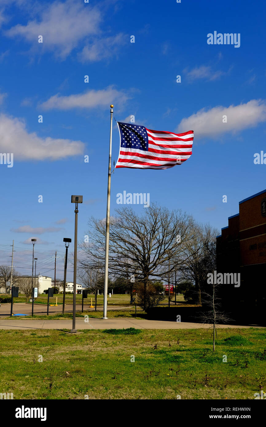 American flag outside the Bryan, Texas, USA post office; flag waving in ...