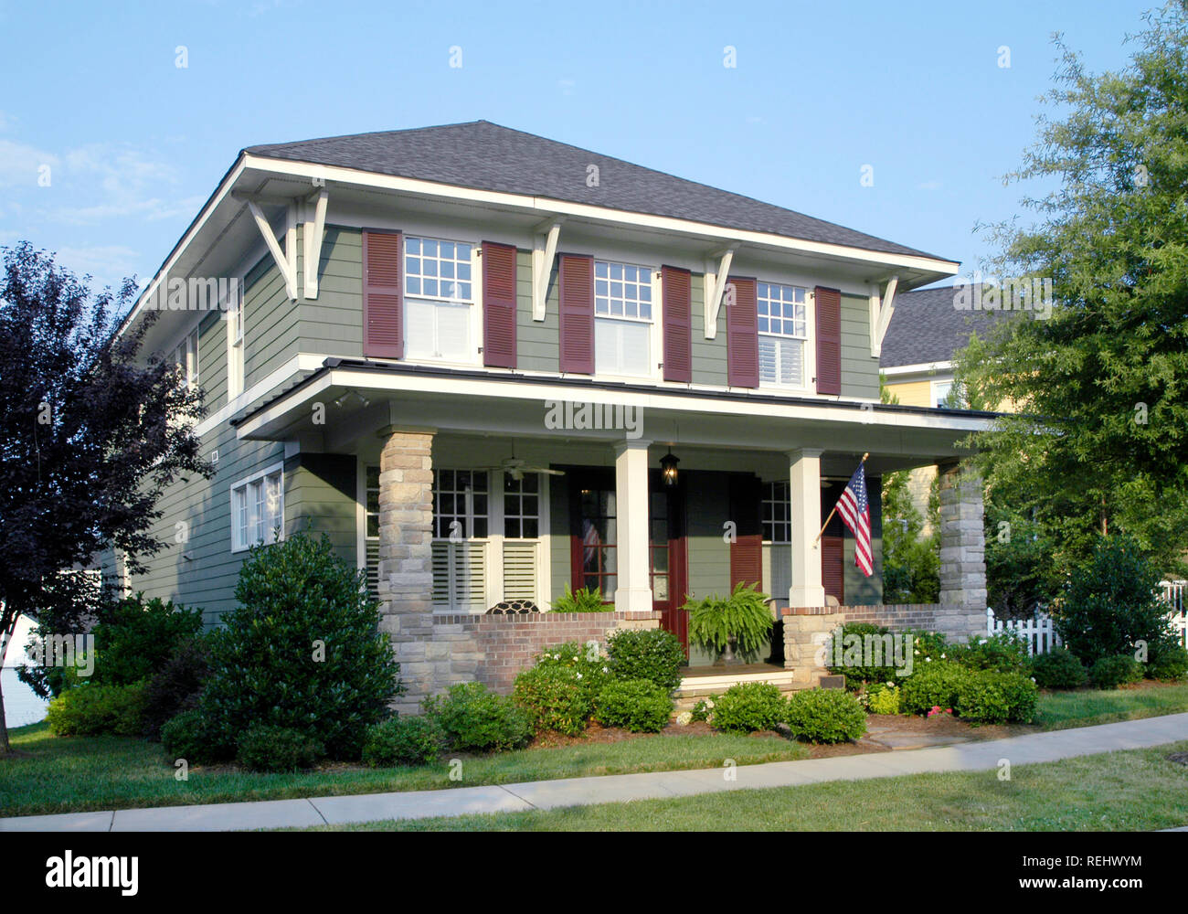 Front Porch with an American Flag Stock Photo - Alamy