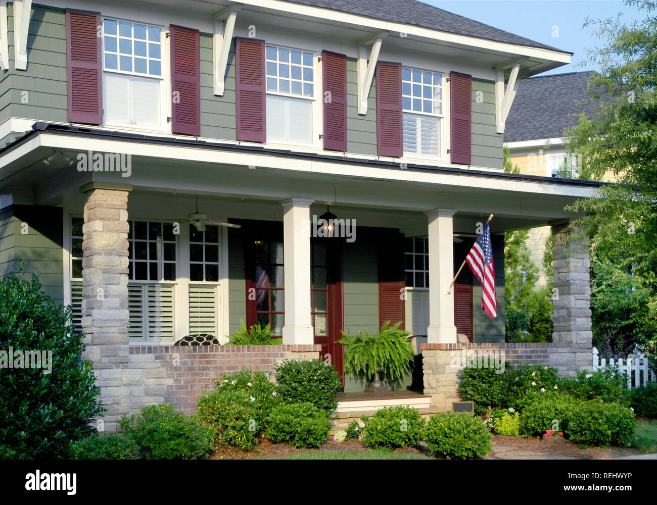 Front Porch with an American Flag Stock Photo - Alamy