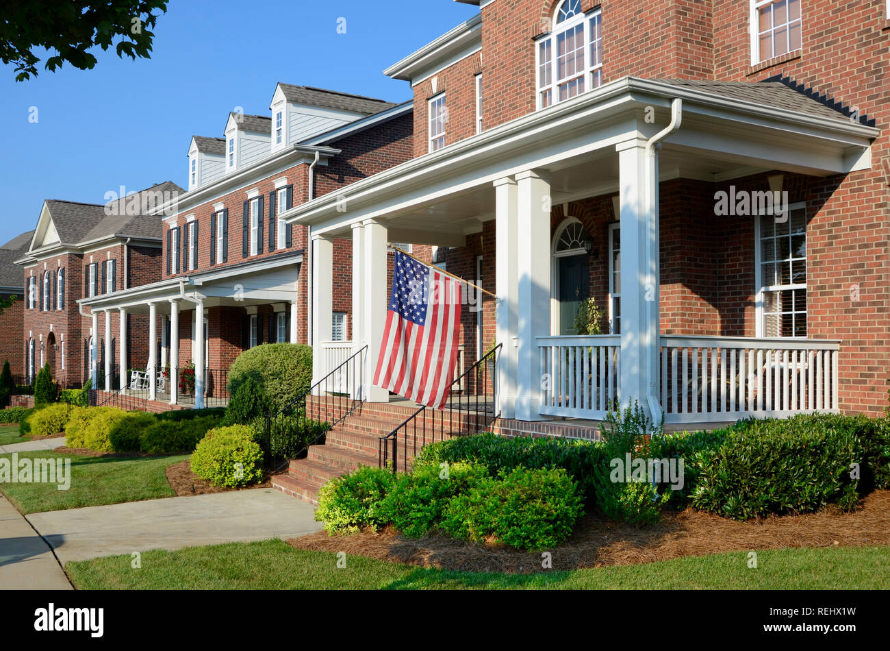 Neighborhood of Brick Houses Stock Photo - Alamy