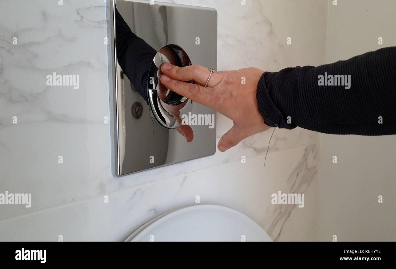 Flushing Water Using Dual Machanism OF Concealed Toilet Cistern Stock ...