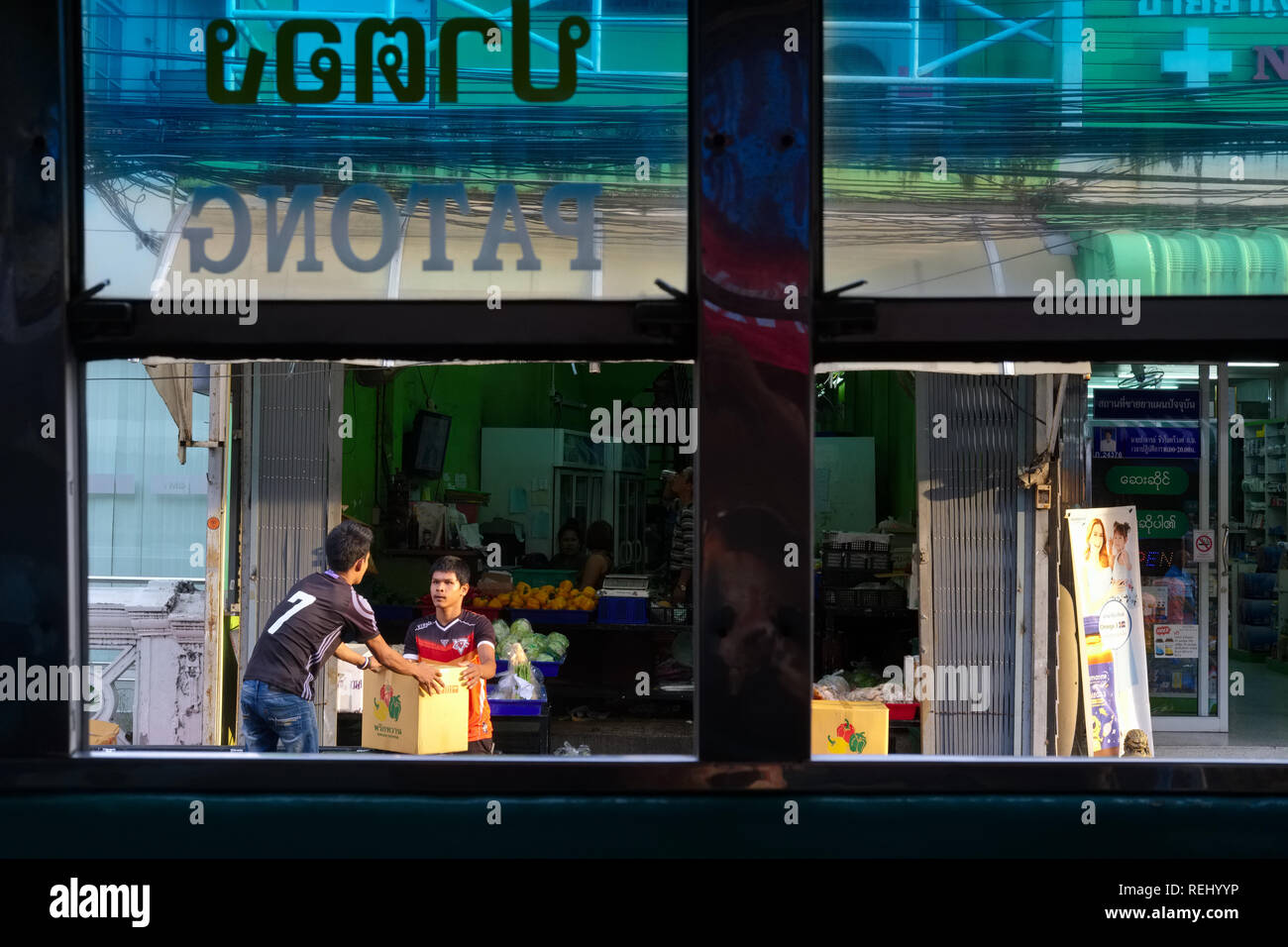 Seen from inside a Songthaew (local bus) going from Phuket Town to ...