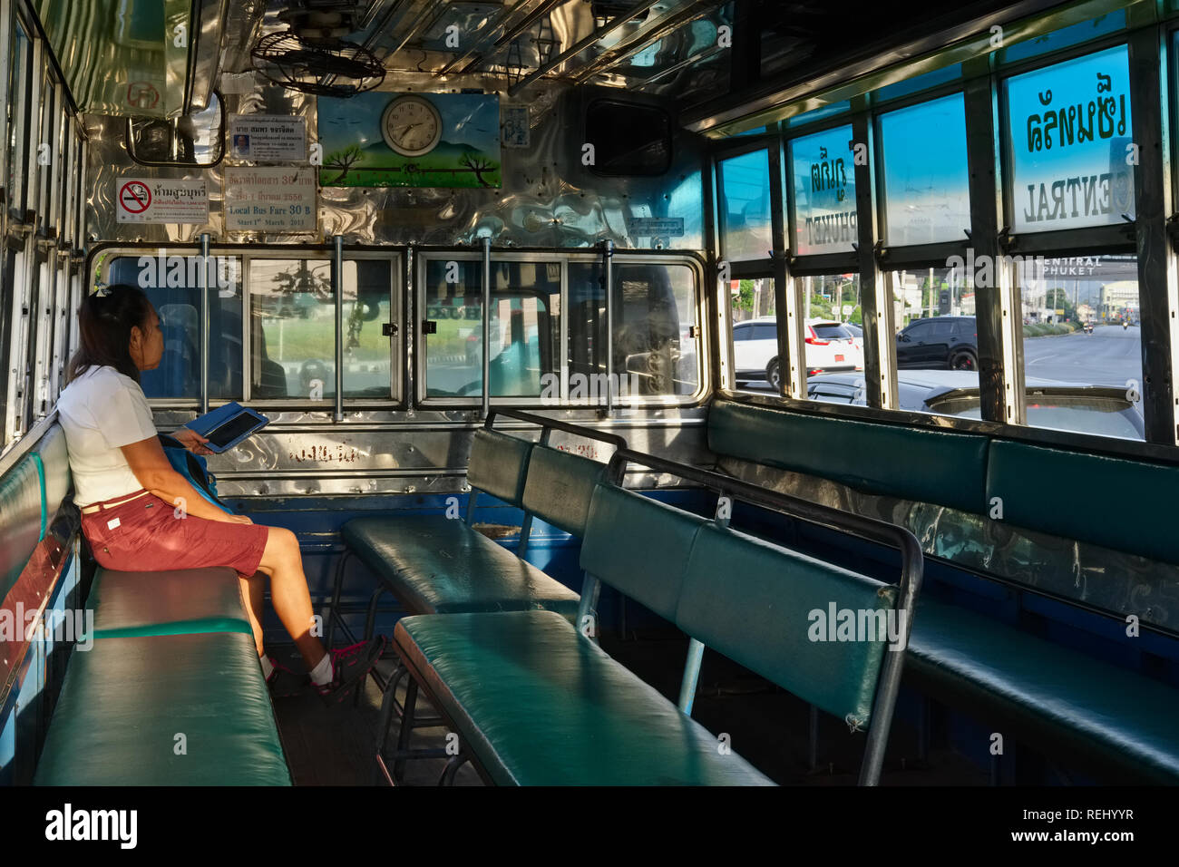Seen inside a Songthaew (old-time local bus) going from Phuket Town to ...