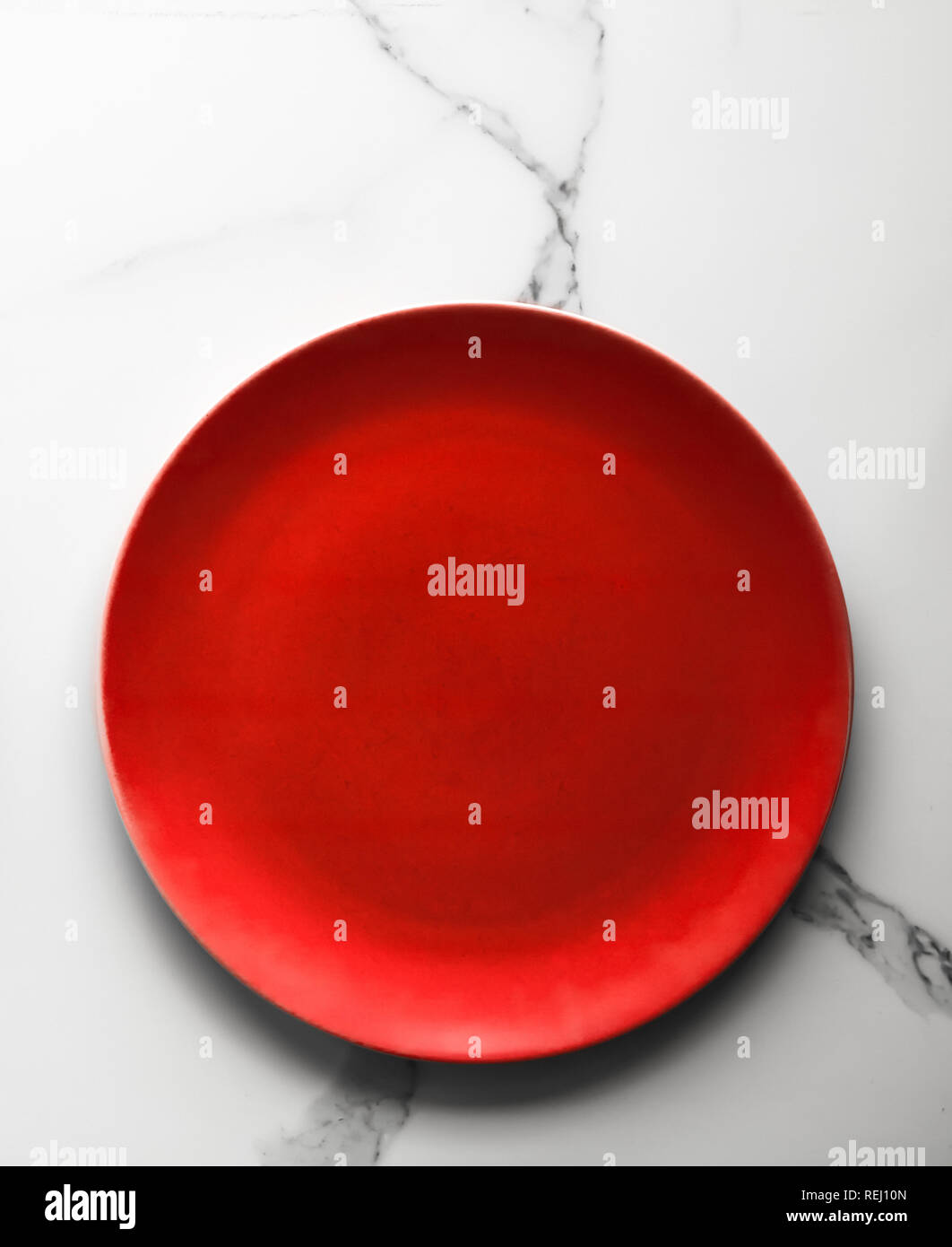 empty red plate on marble - recipe and restaurant mockup flatlay styled ...
