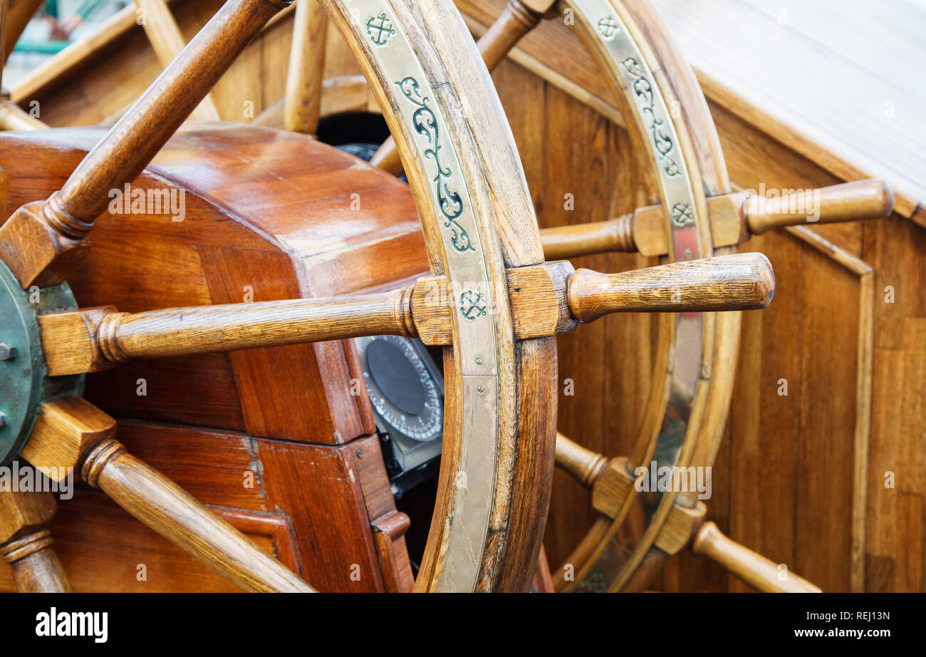 wooden ship retro steering wheel outdoor closeup Stock Photo - Alamy