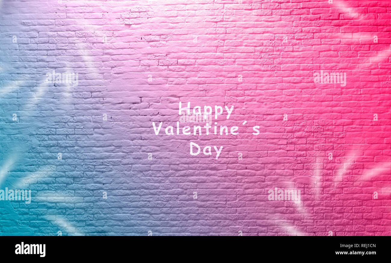 happy valentine day lettering in front of aged white brick wall ...