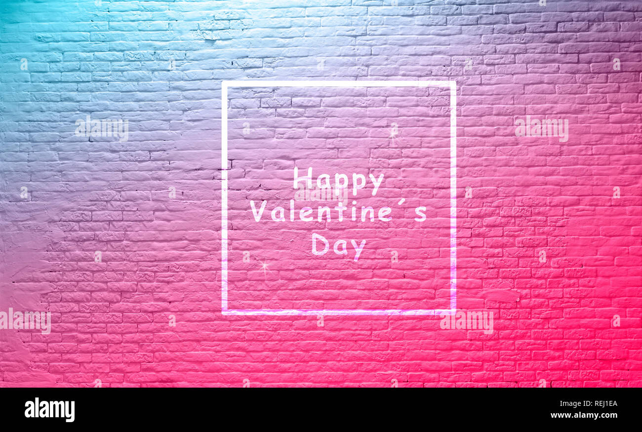 happy valentine day lettering in front of aged white brick wall ...