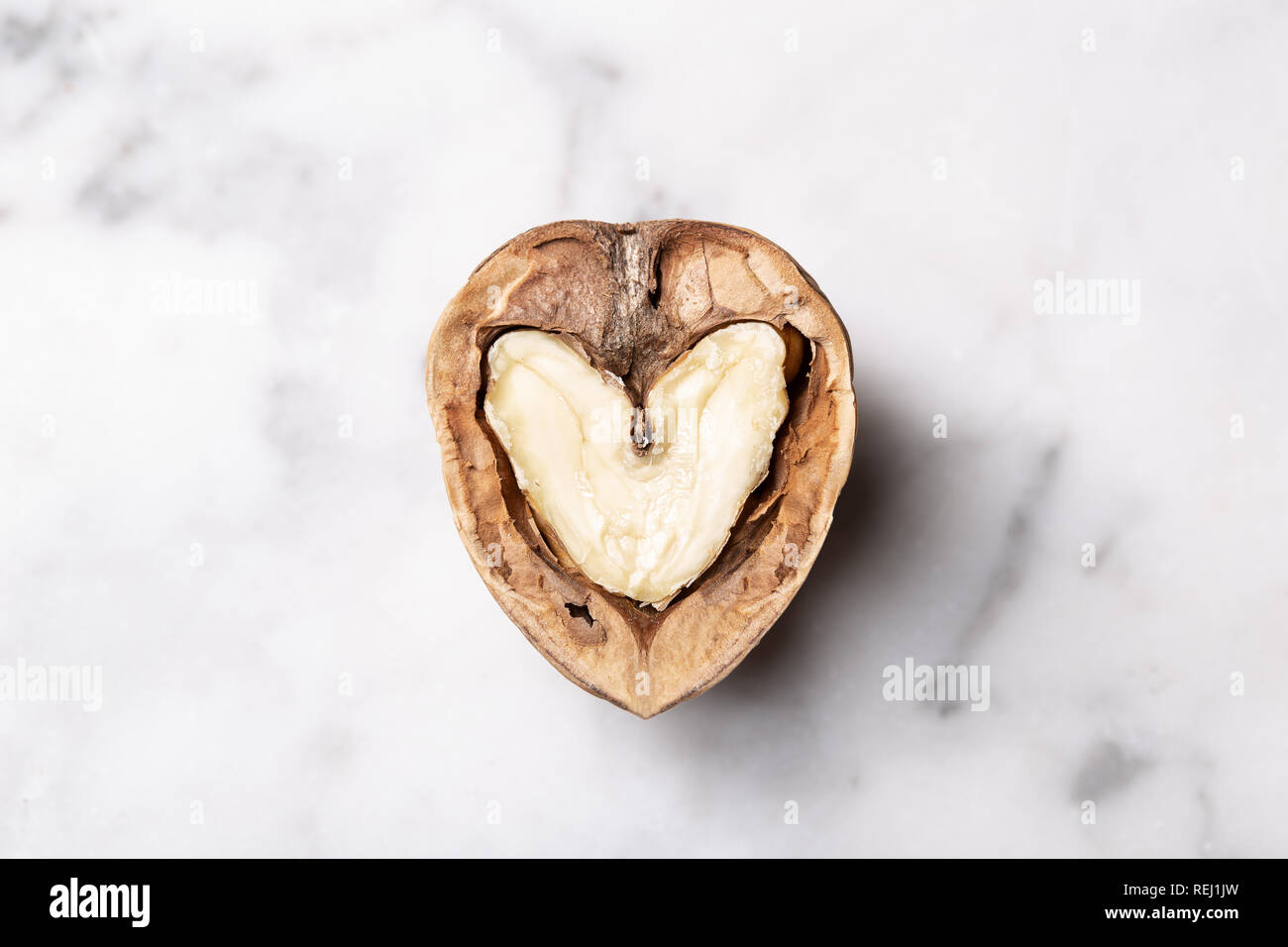 Walnut heart isolated. Love concept. Healthy food Stock Photo - Alamy
