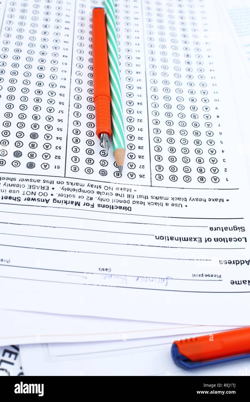 Portrait of pen and pencil on the omr sheet Stock Photo - Alamy