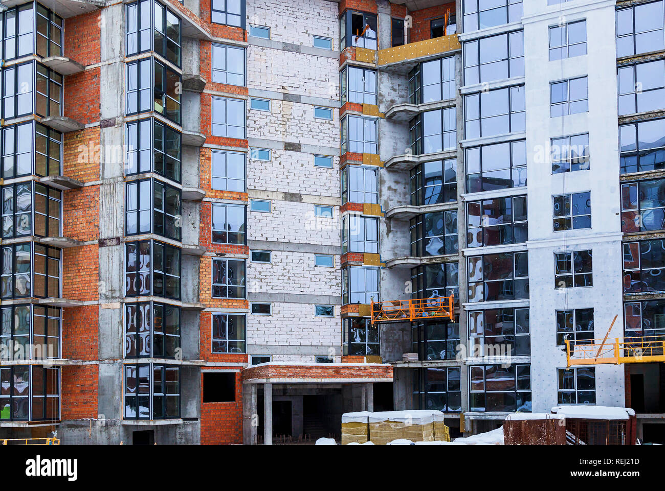 The glass facade of residential apartments in a high-rise building ...