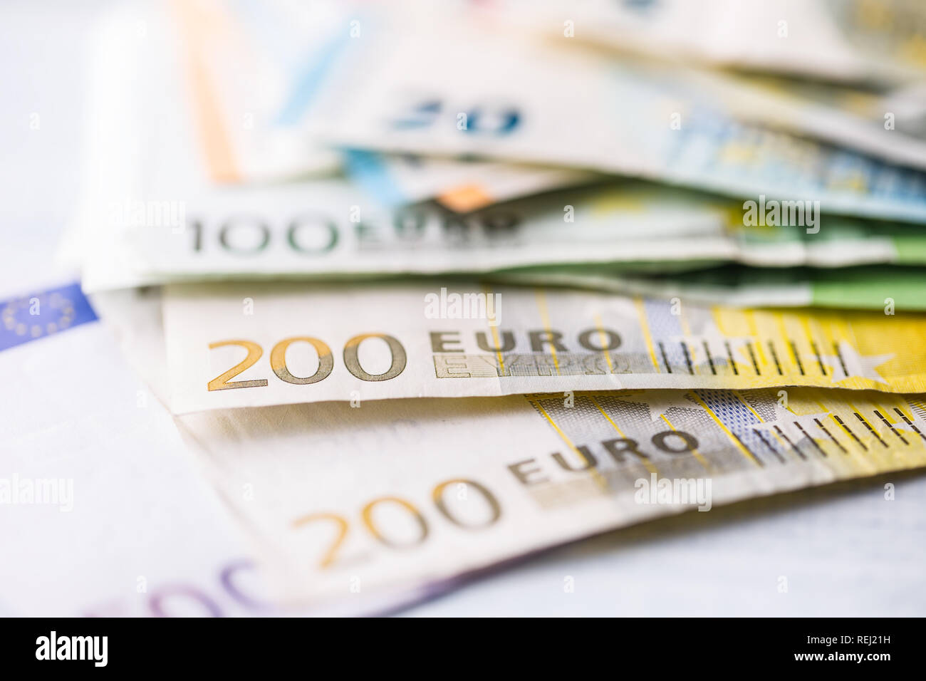 Two hundred euro banknotes in detail on the pile of other nominal ...