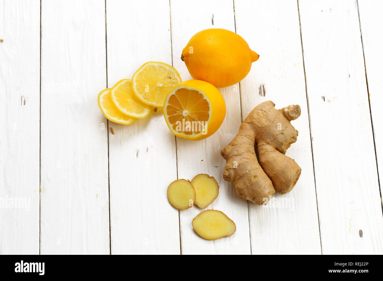 Still life with ginger and lemon on white background Stock Photo - Alamy