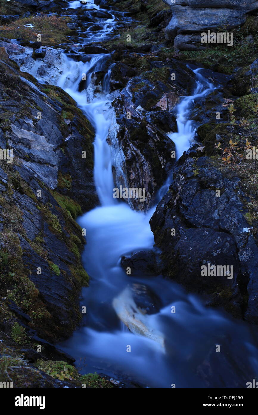 Cold ice mountain creek Stock Photo - Alamy