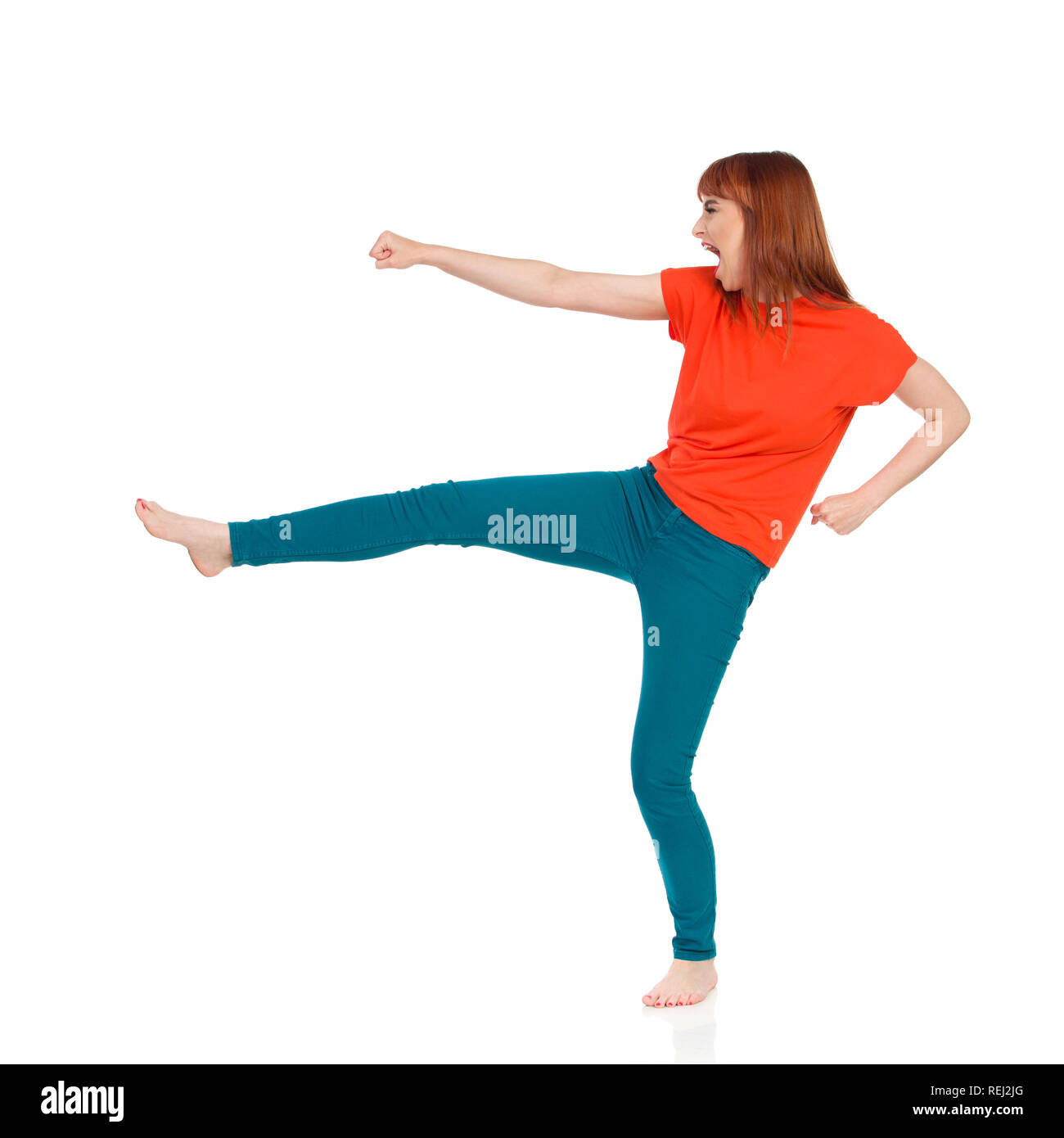 Female barefoot jeans Cut Out Stock Images & Pictures - Alamy