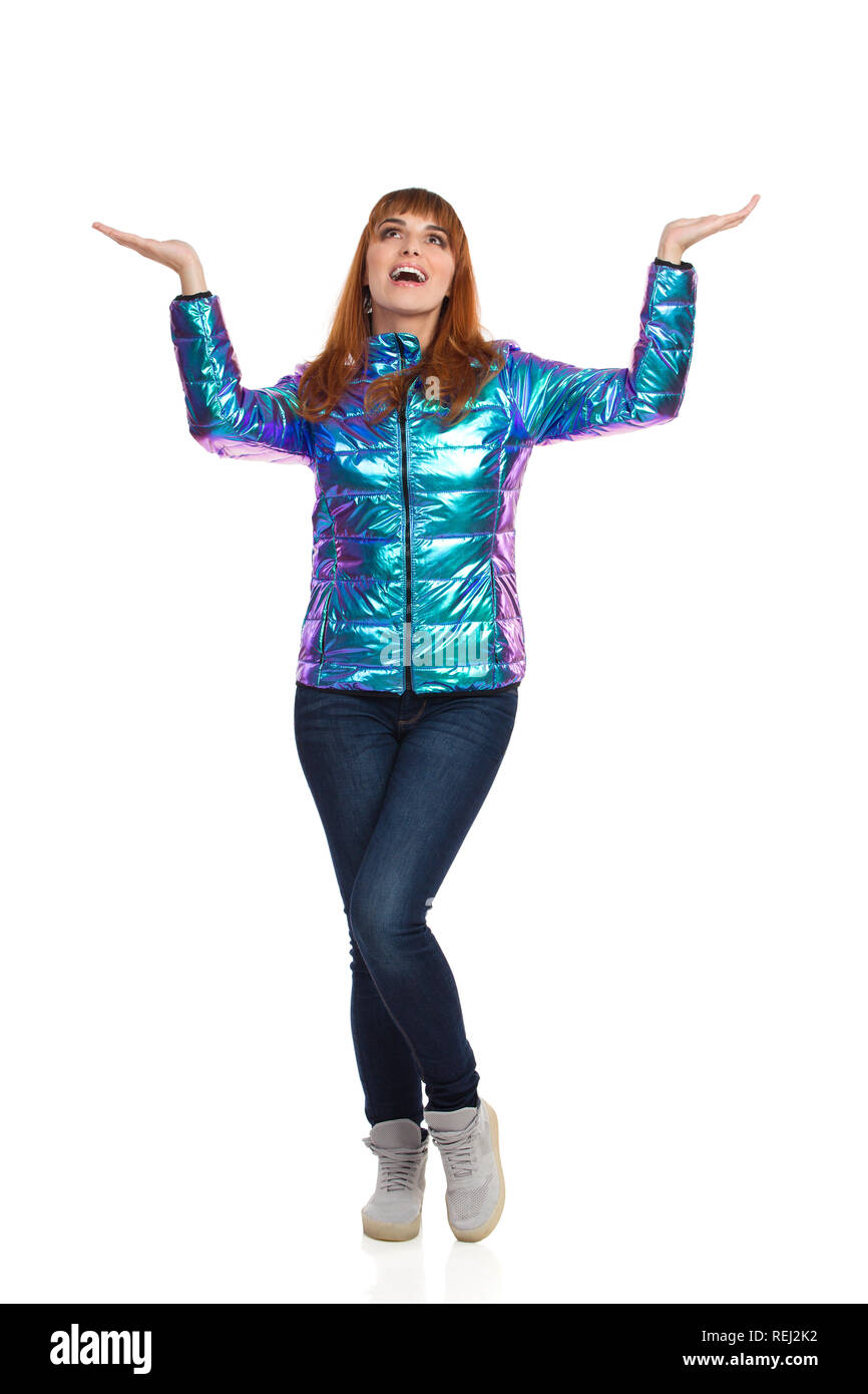 Hands raised over her head Cut Out Stock Images & Pictures - Alamy