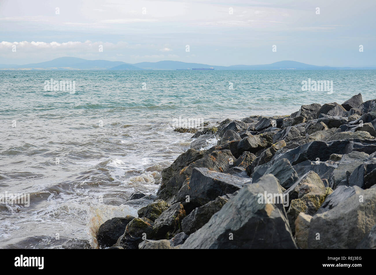 sea beach with rocks Stock Photo - Alamy