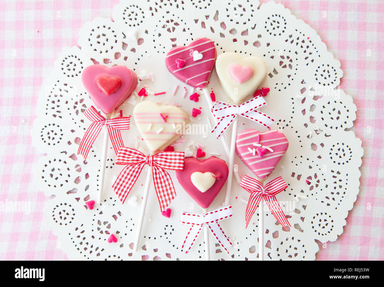 Little pink cake pops with sugar sprinkles Stock Photo - Alamy