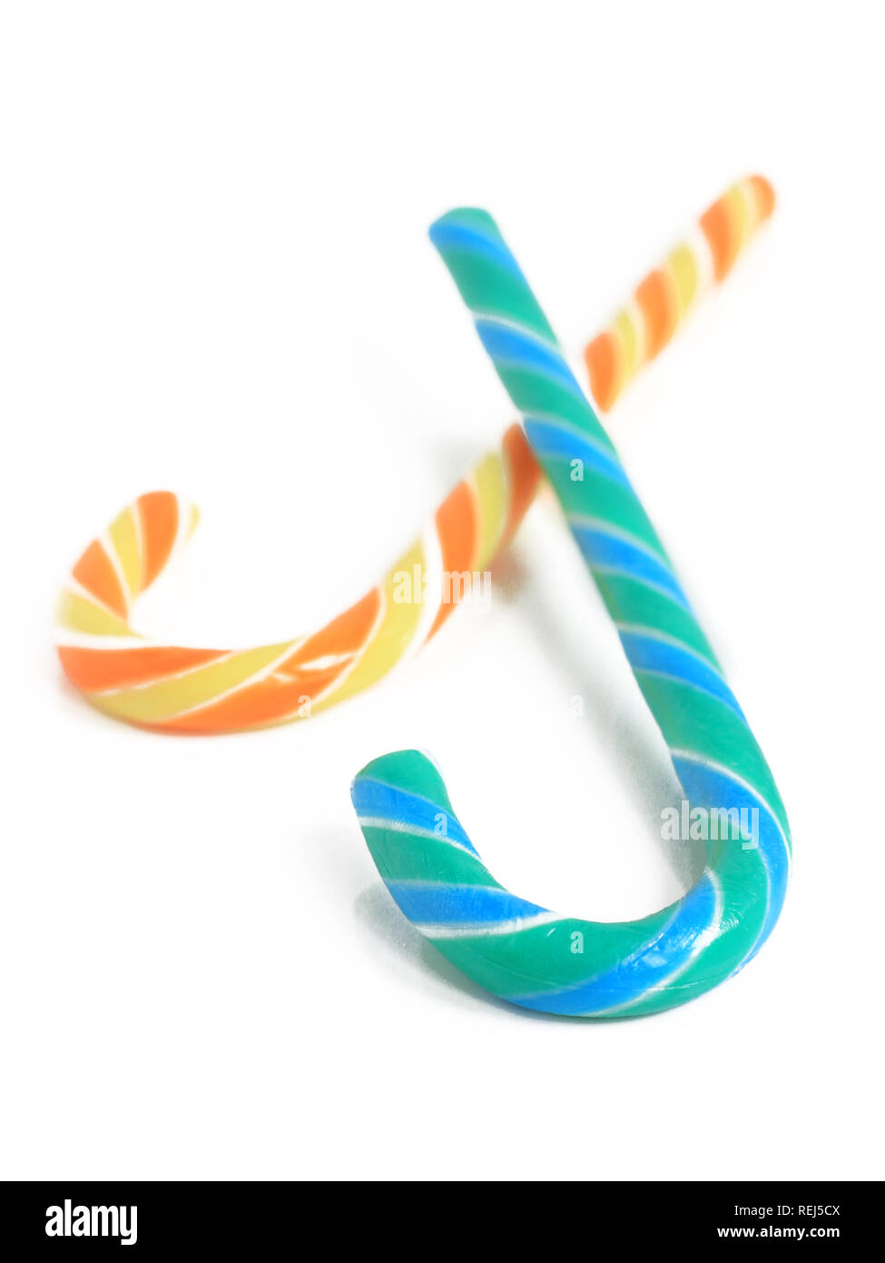 Two candy canes, isolated on white Stock Photo - Alamy
