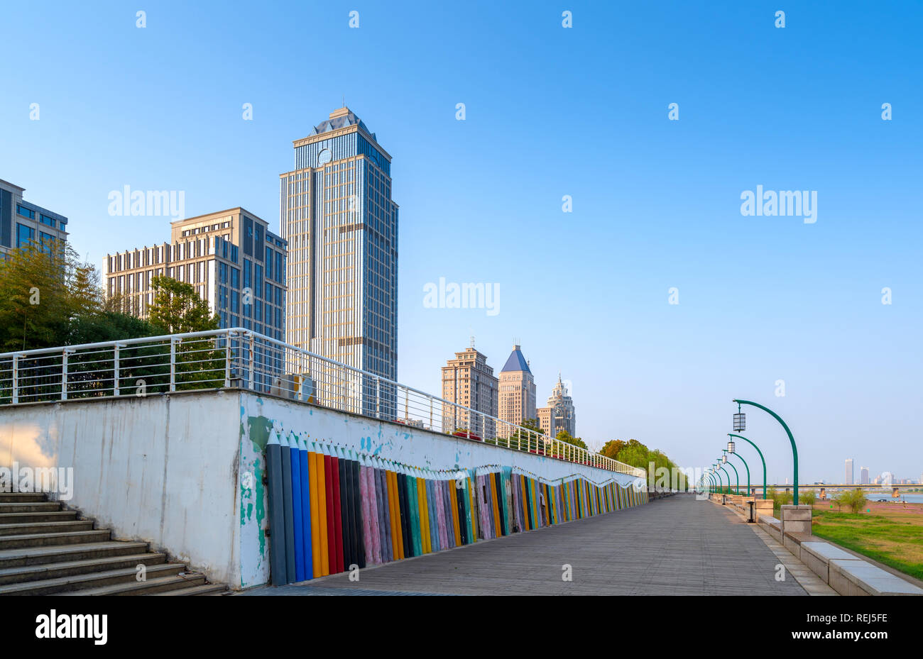 Riverside path and modern architecture Stock Photo - Alamy