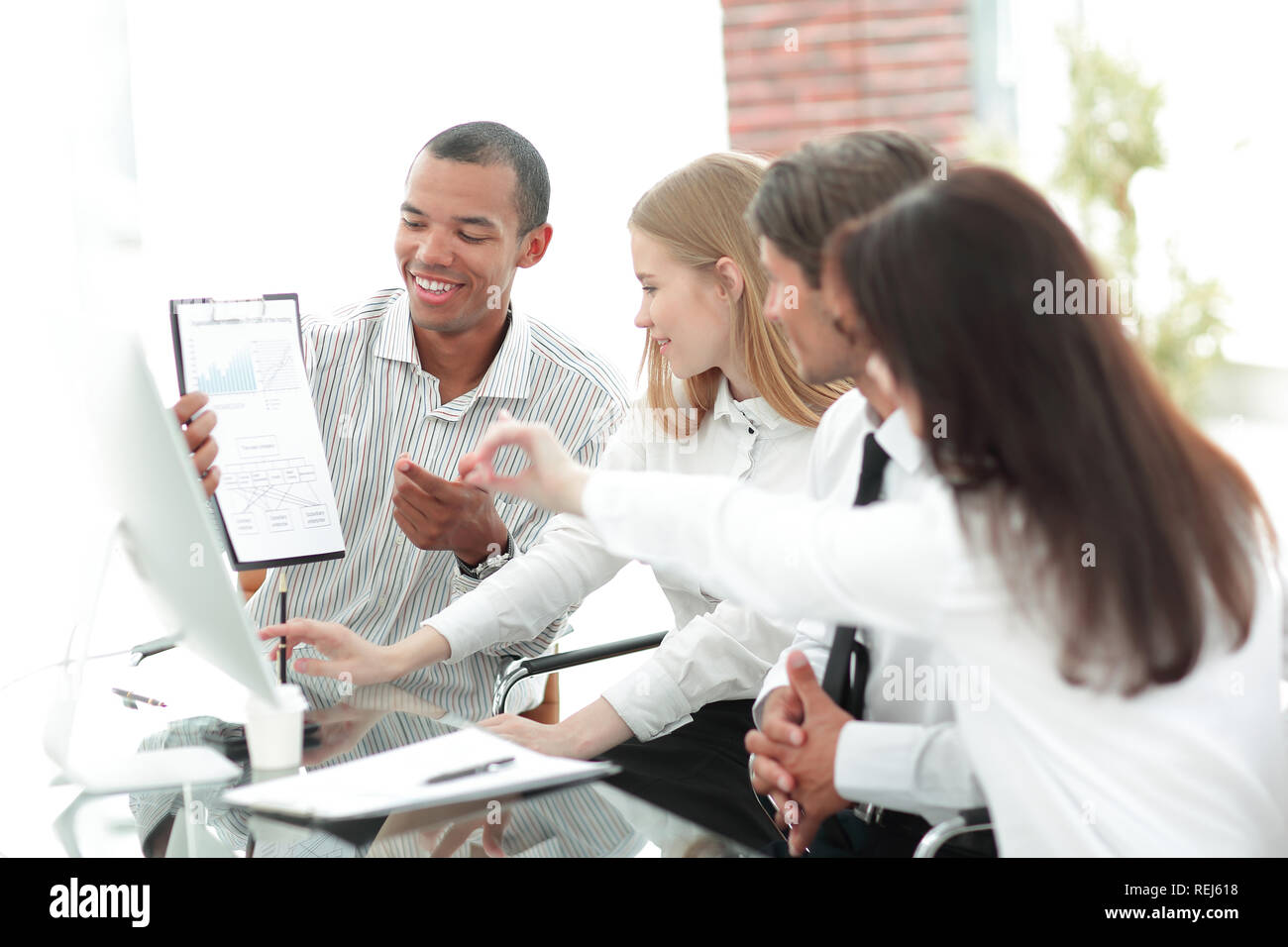 professional business team discussing new information in the office ...